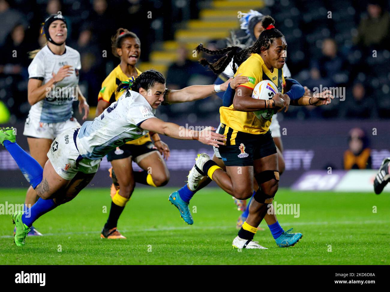 Papua New Guinea's Belinda Gwasamun powers through to score during the ...
