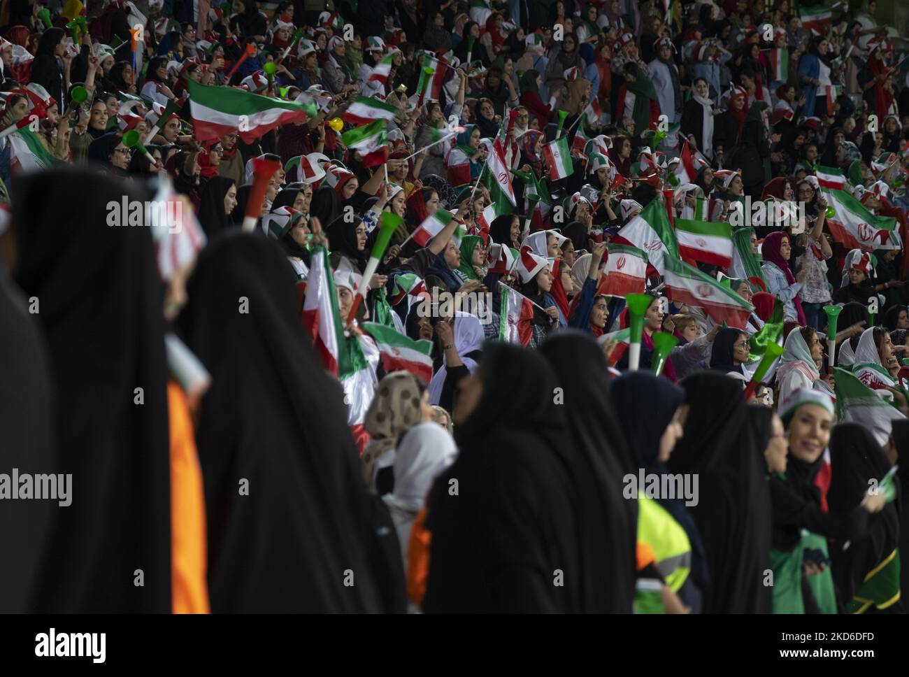 Female security personnels monitor an area as Iranian soccer female ...