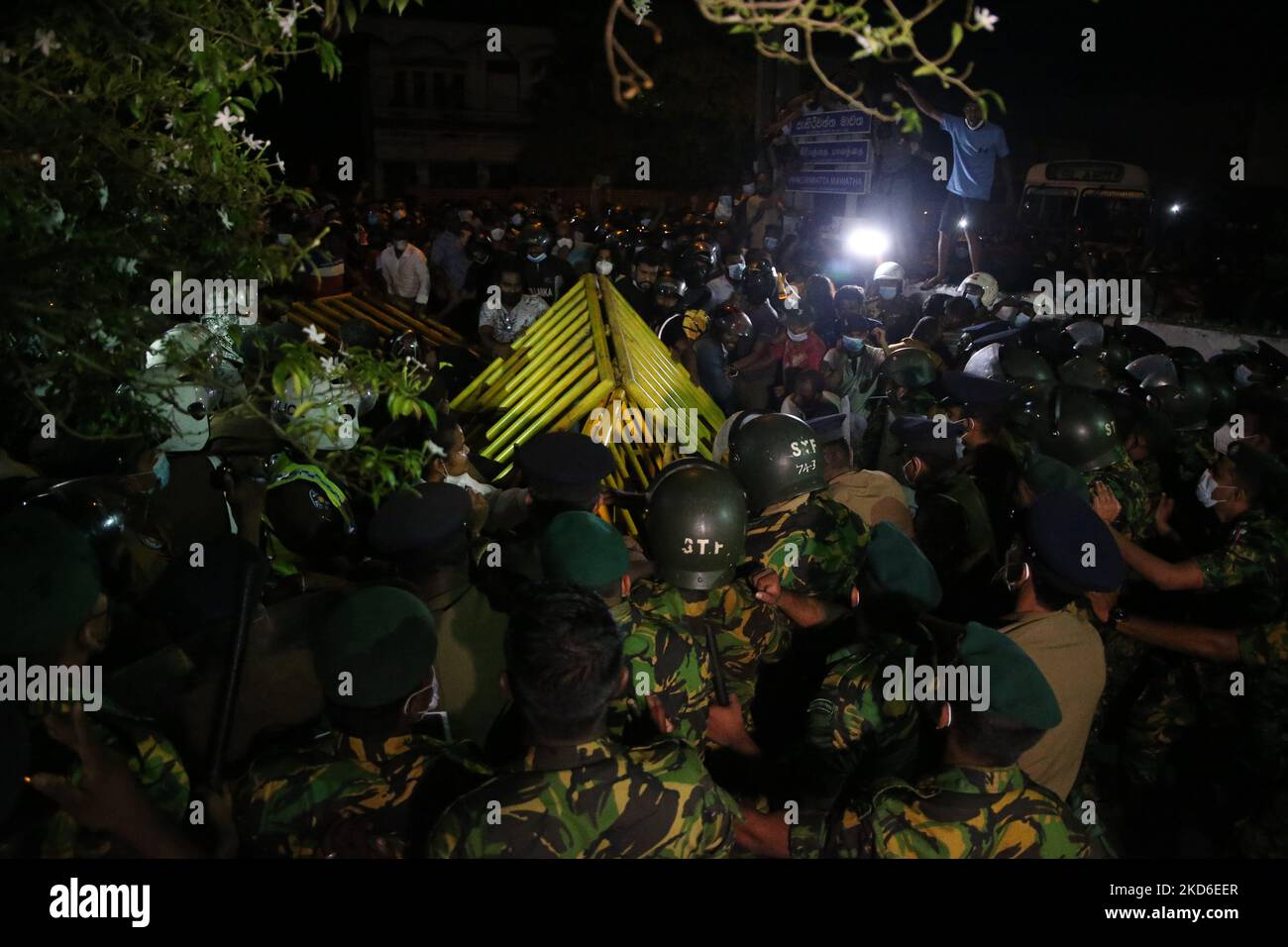 People clash with police outside the Sri Lankan president's private ...