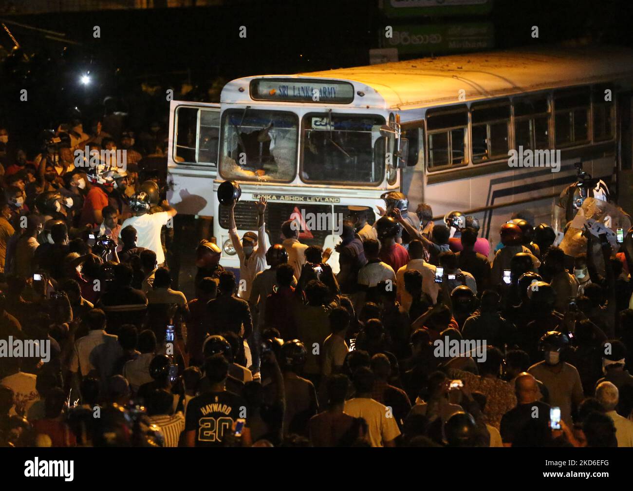 Demonstrators reacts in a protest outside the Sri Lankan president's ...