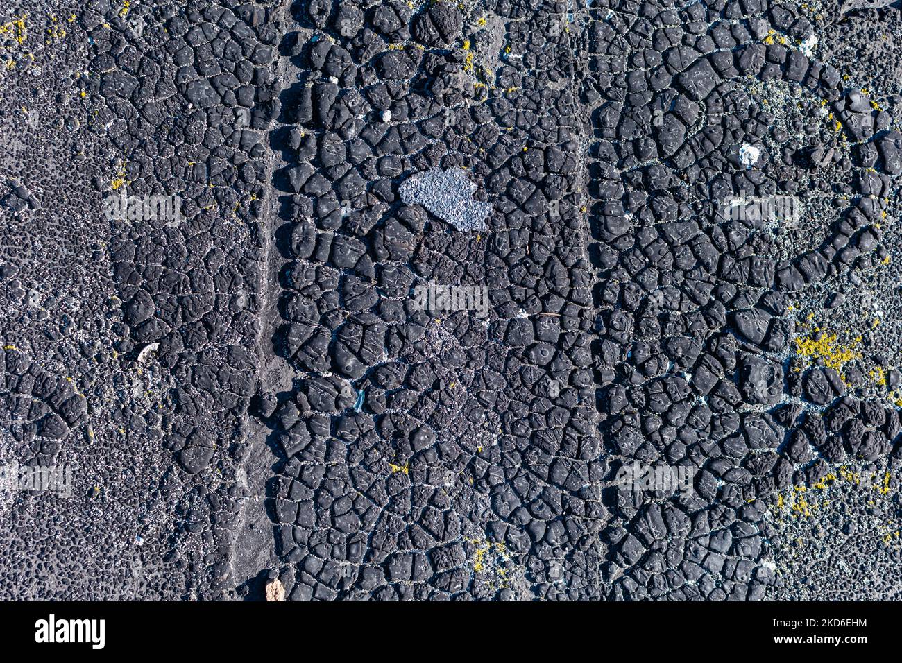 Old cracked black resin surface on roof of house for renovation Stock ...