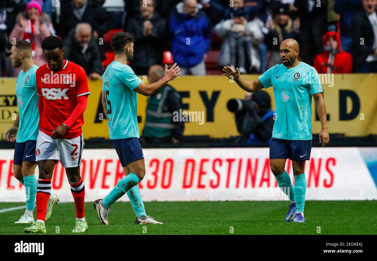 Coalville Town's Ashley Chambers (right) celebrates after scoring with ...