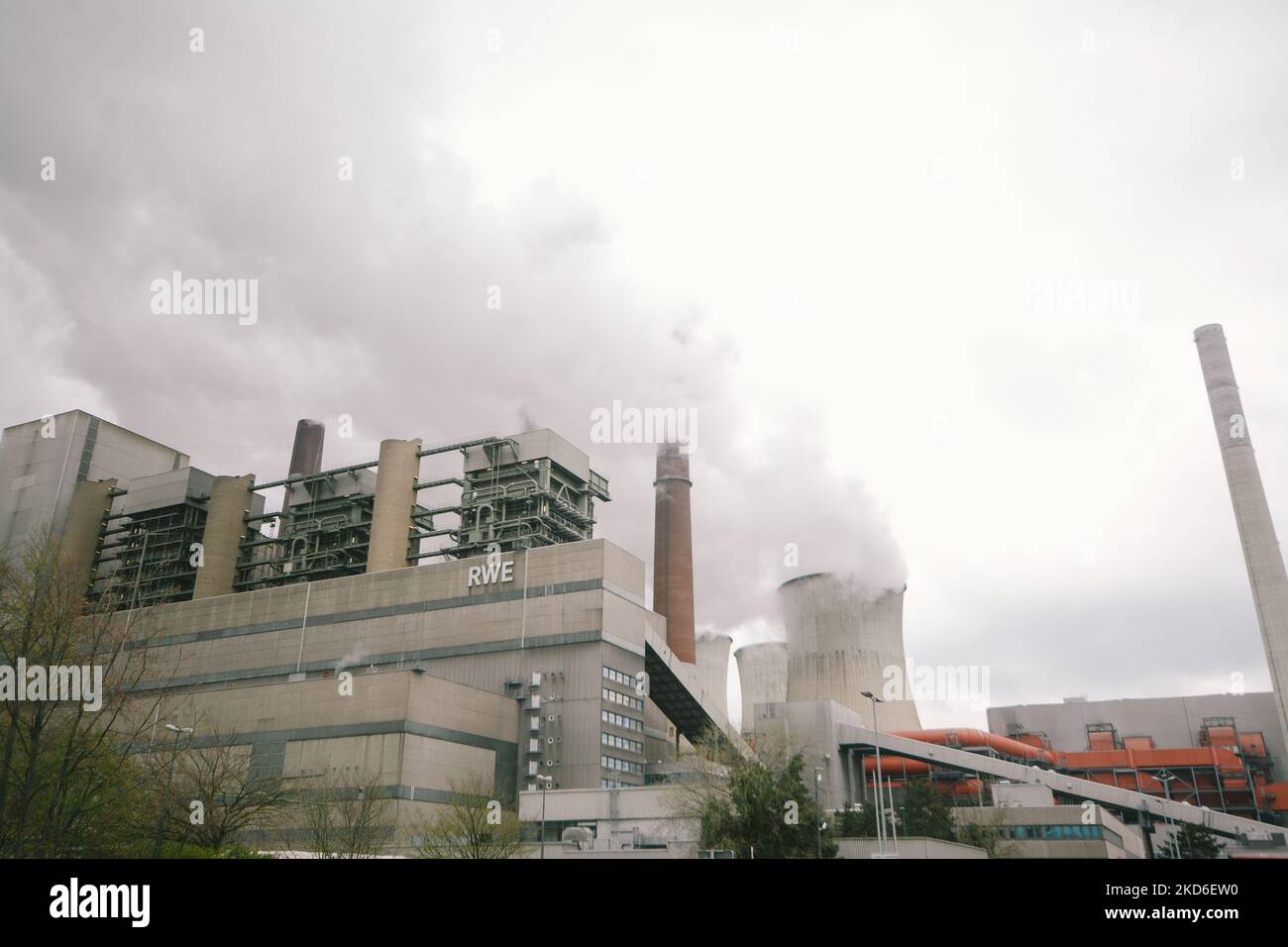 Steam is seen from cooling towers of German energy giant RWE power AG ...