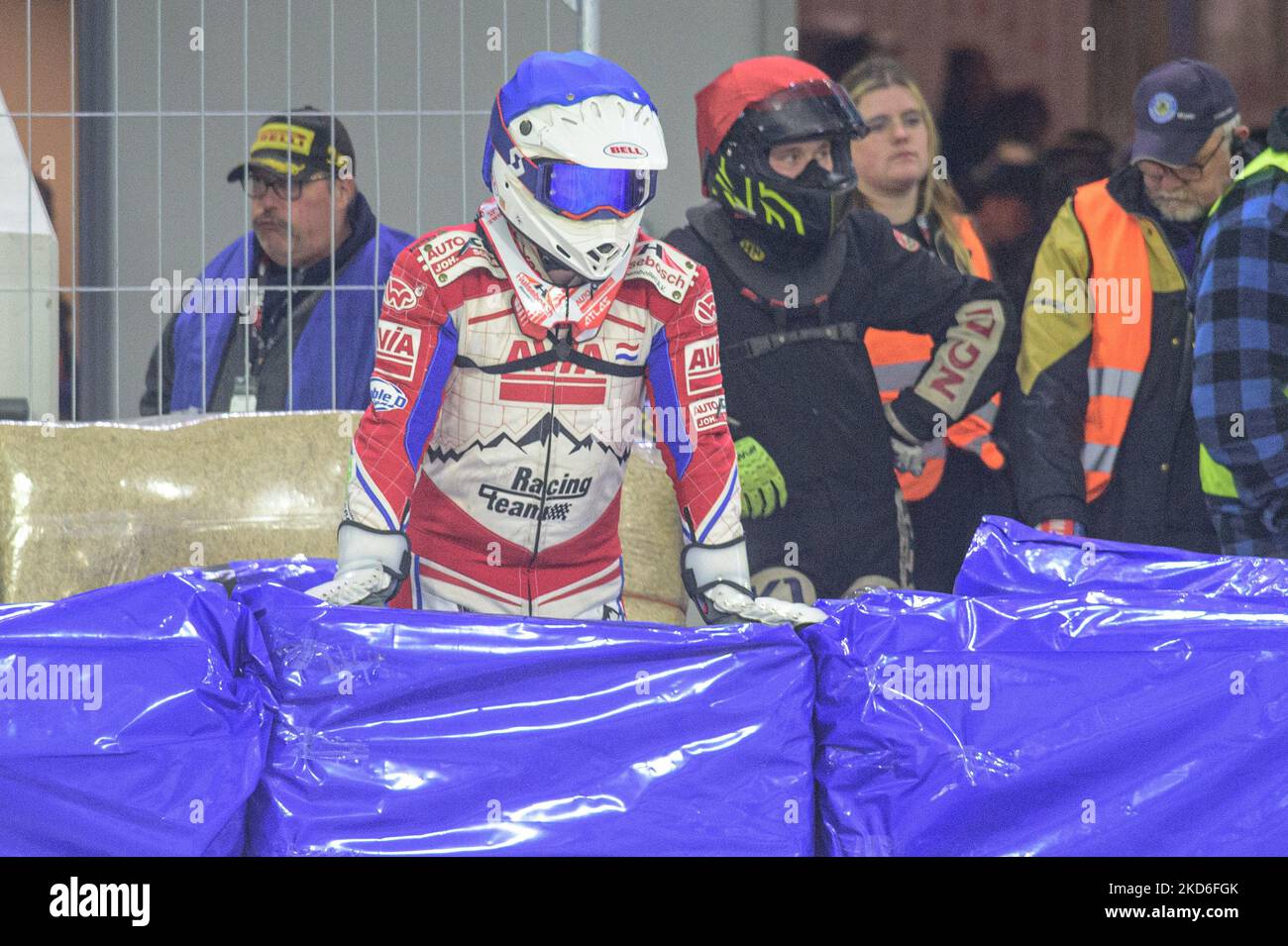 . Martin Posch (left) and Henri Ahlbom watch the track prep during the ...