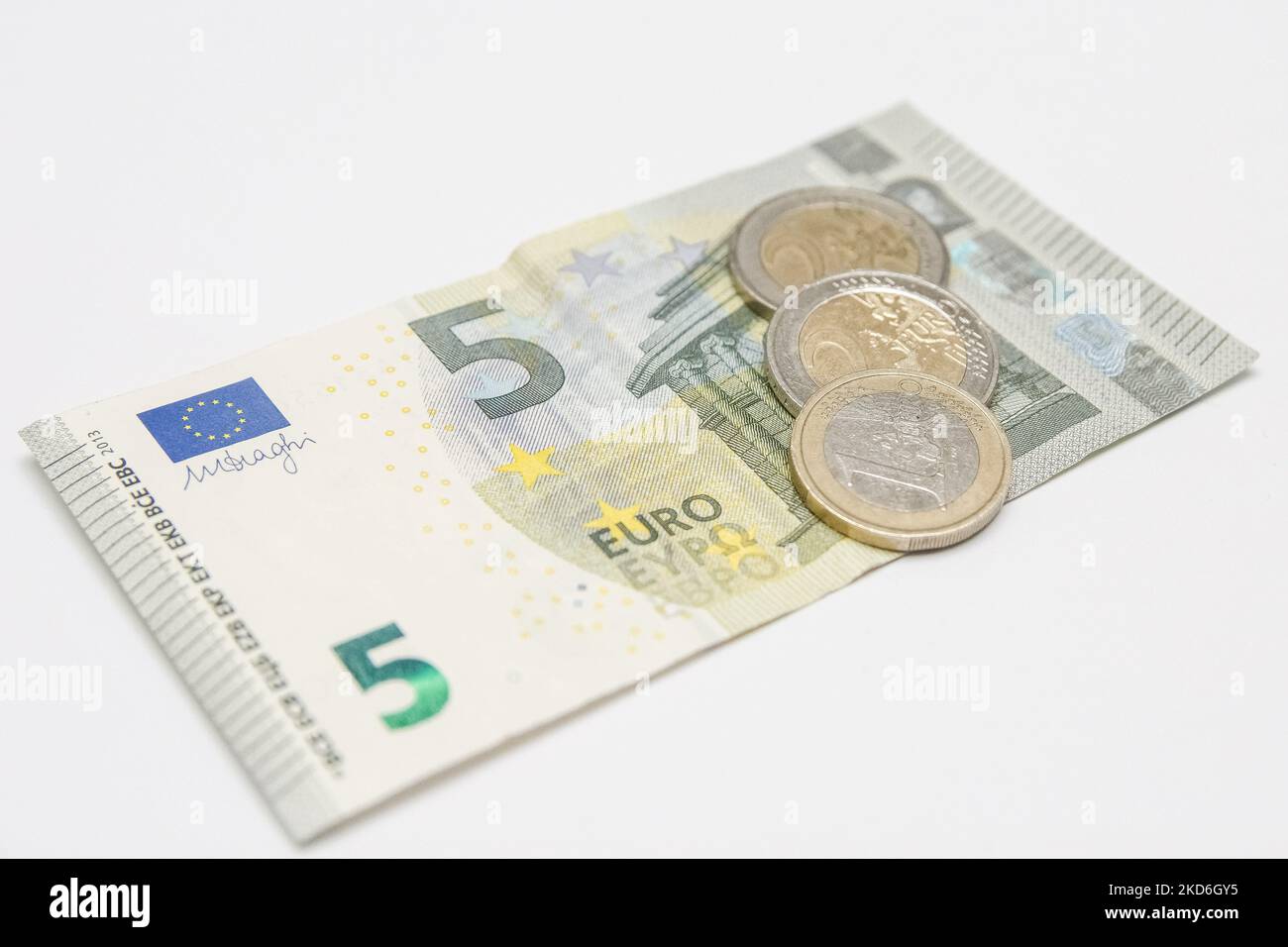 In this photo illustration a 20 Euro note, a 5 Euro note and Euro coins ...