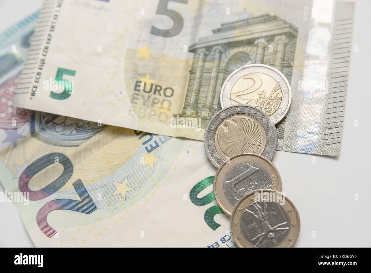 In this photo illustration a 20 Euro note, a 5 Euro note and Euro coins ...