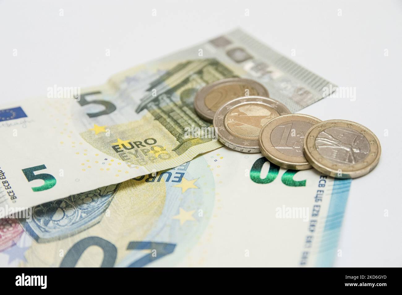 In this photo illustration a 20 Euro note, a 5 Euro note and Euro coins ...