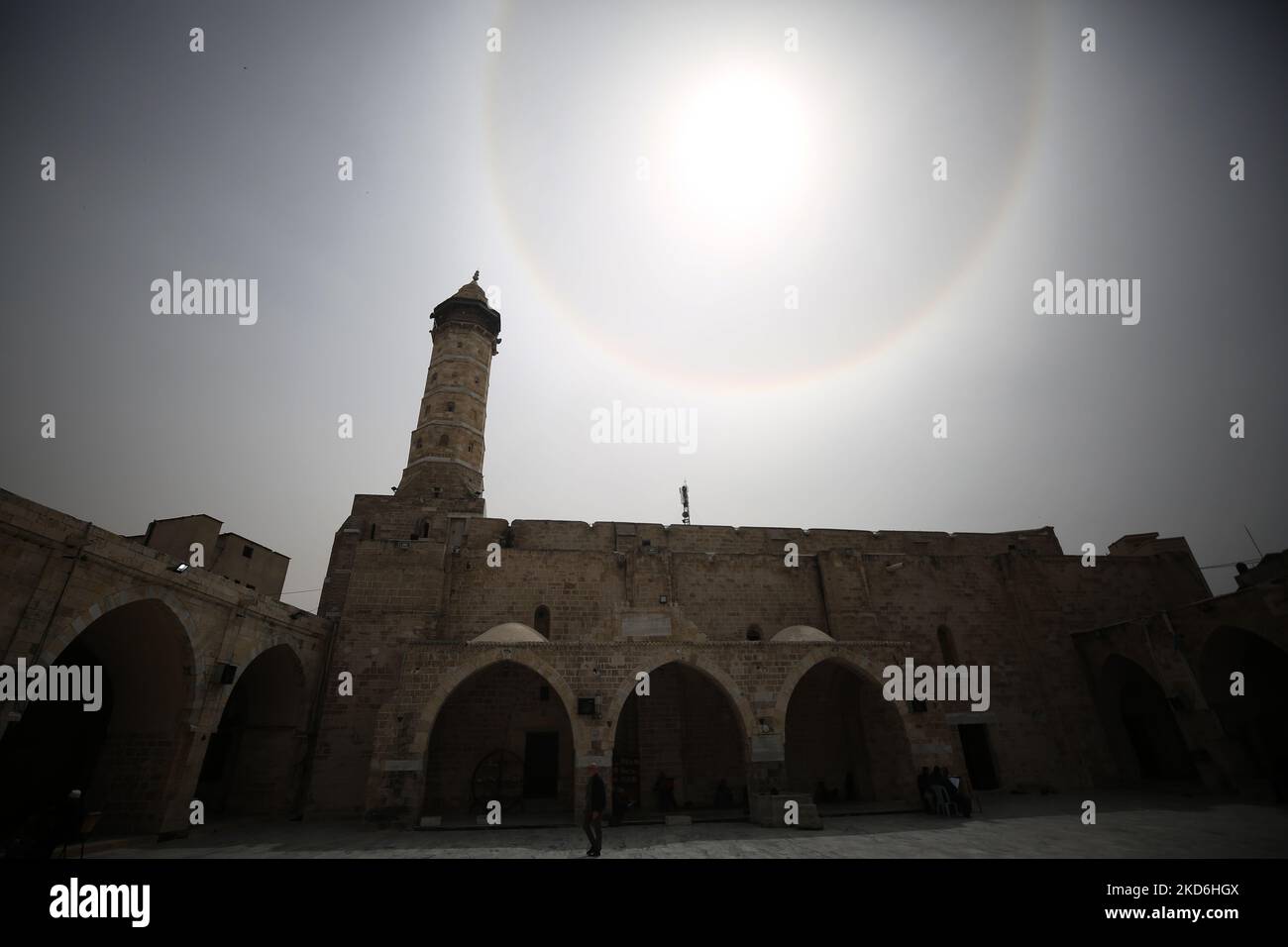 View of a halo around the sun over al-Omari mosque in Gaza City, on ...