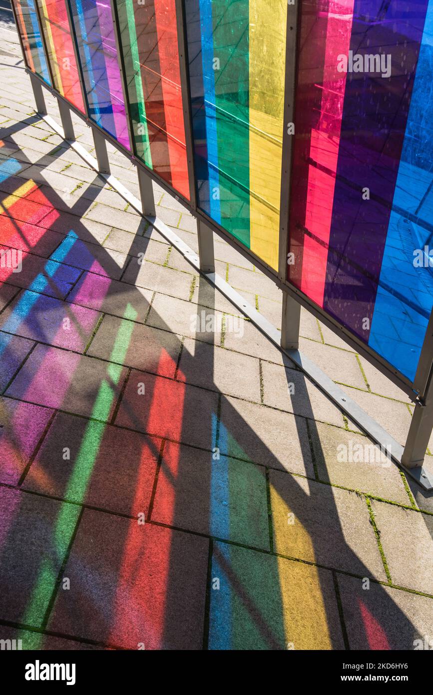 Coloured glass transmitting patterns on a tented style sculpture near ...