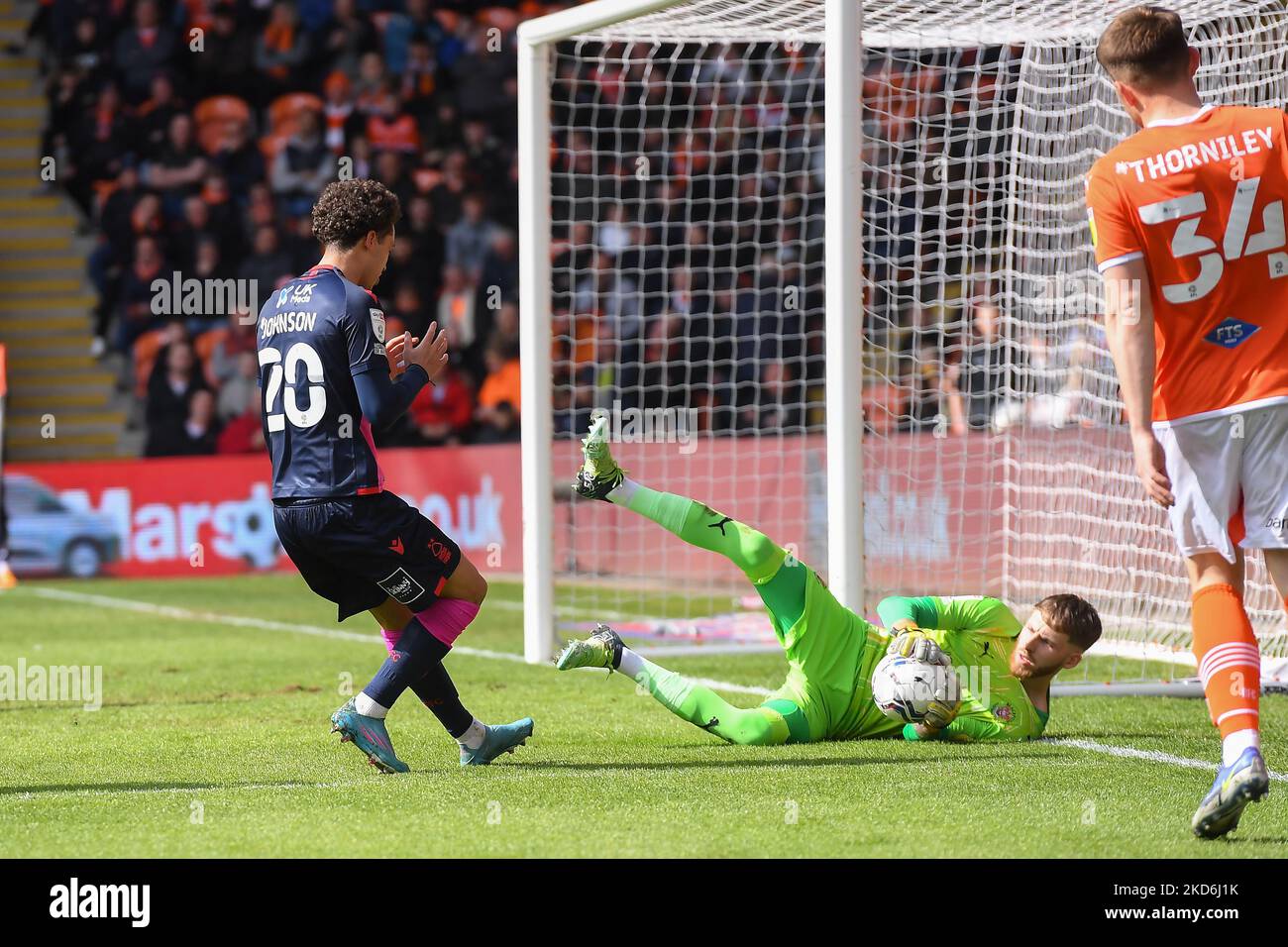 Daniel Grimshaw of Blackpool saves a close range attempt at goal from ...