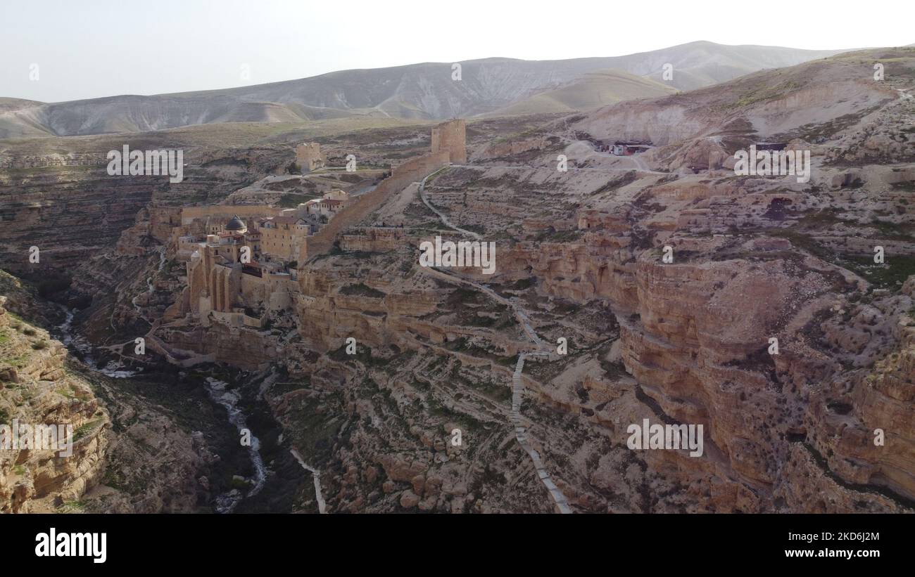 An aerial shot of the ancient Mar Saba Monastery built on rocky ...