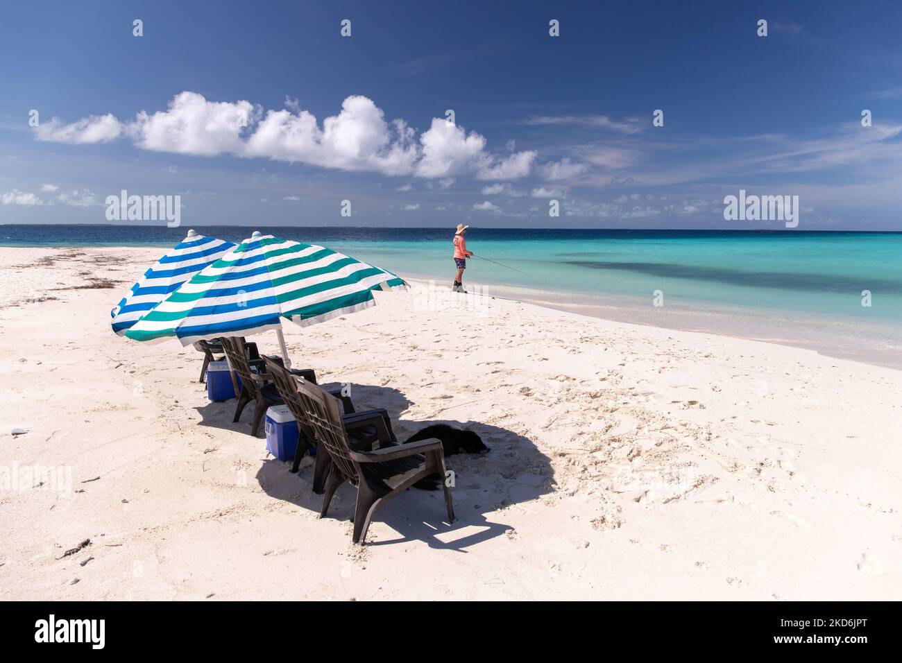 A man fishing in the clear water in White Sand Beach Venezuela Los ...