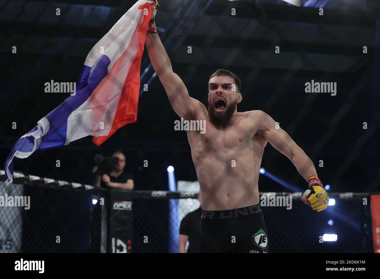 Adam Cullen celebrates defeating Ndiaye El Hadji during the Cage ...