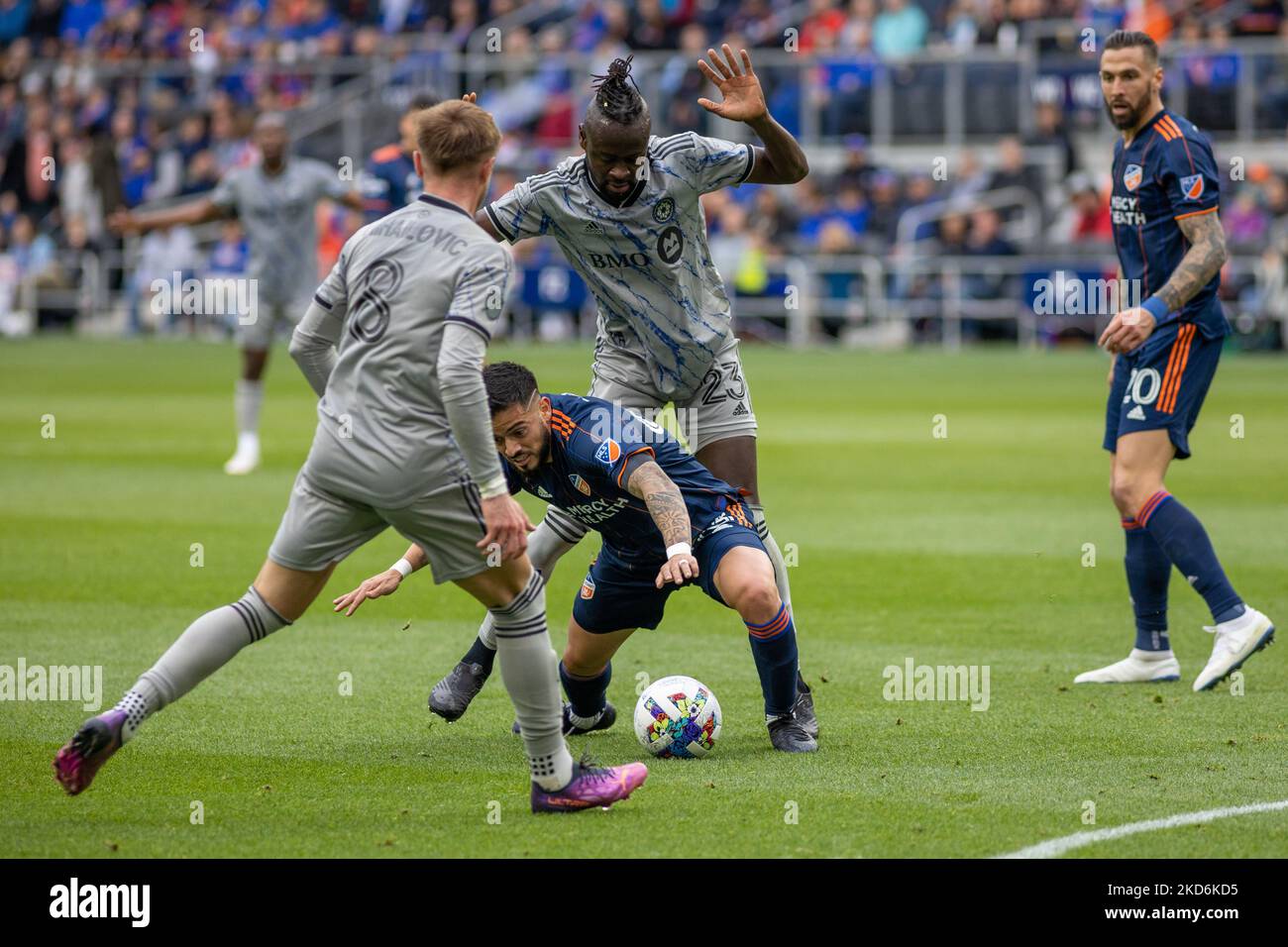 Kel Kamara of CF Montreal and Junior Moreno of FC Cincinnati compete ...