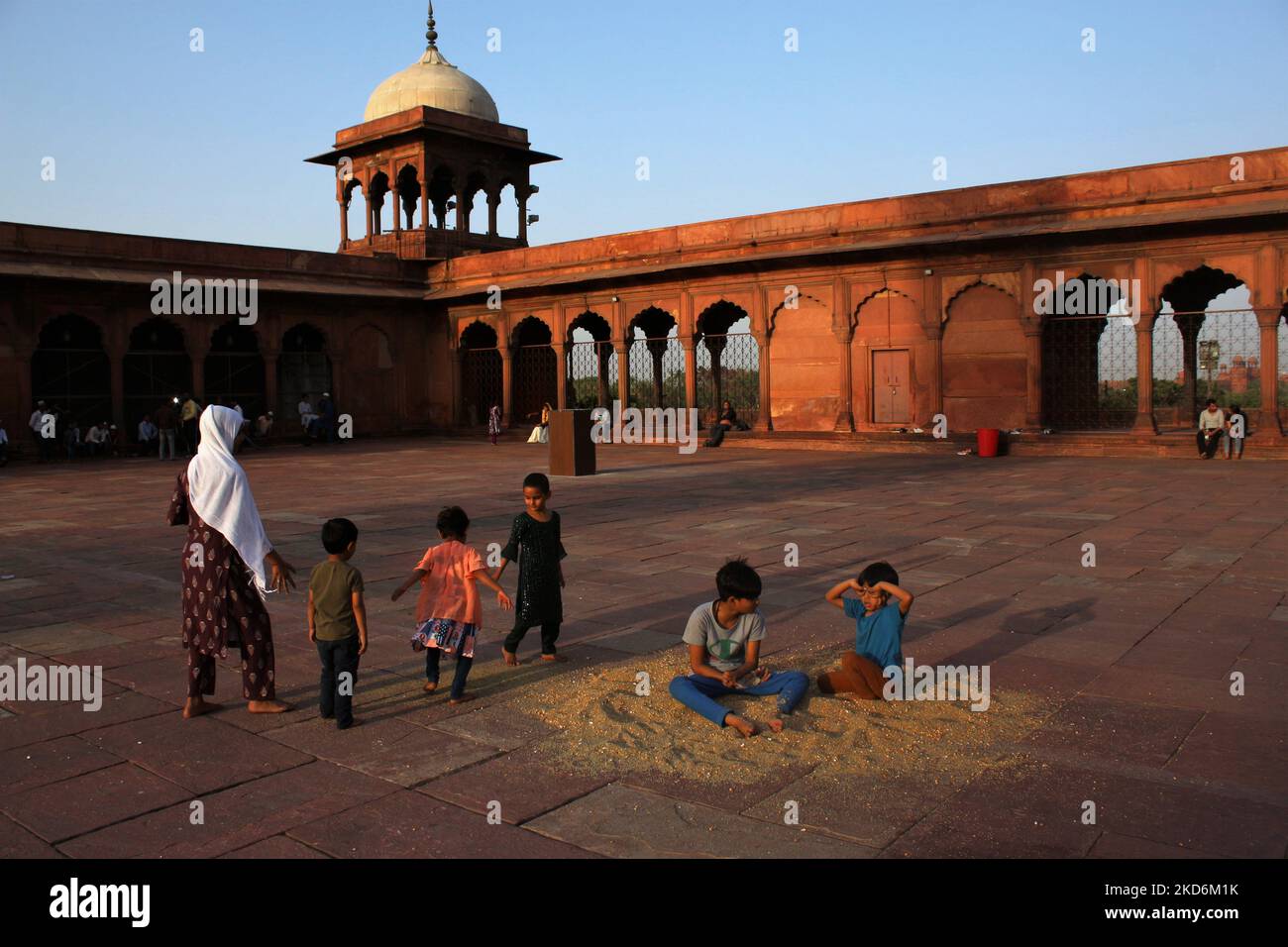 Children play inside the Jama Masjid complex on the first day of the ...
