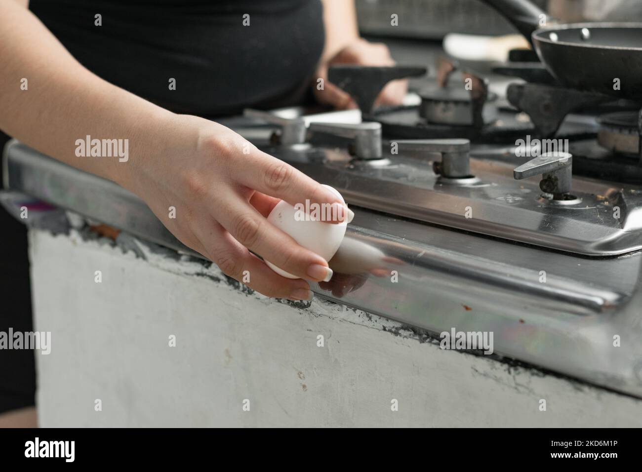 Grabbing egg hi-res stock photography and images - Alamy