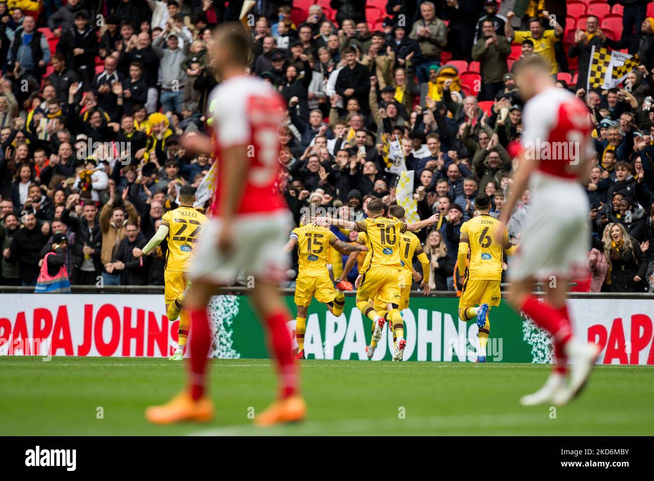 Donovan Wilson of Sutton United celebrates after scoring during the ...