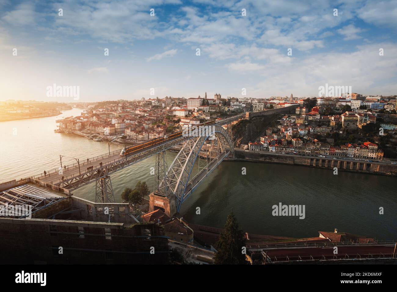 Dom Luis I Bridge with train, City Skyline and Douro River - Porto ...