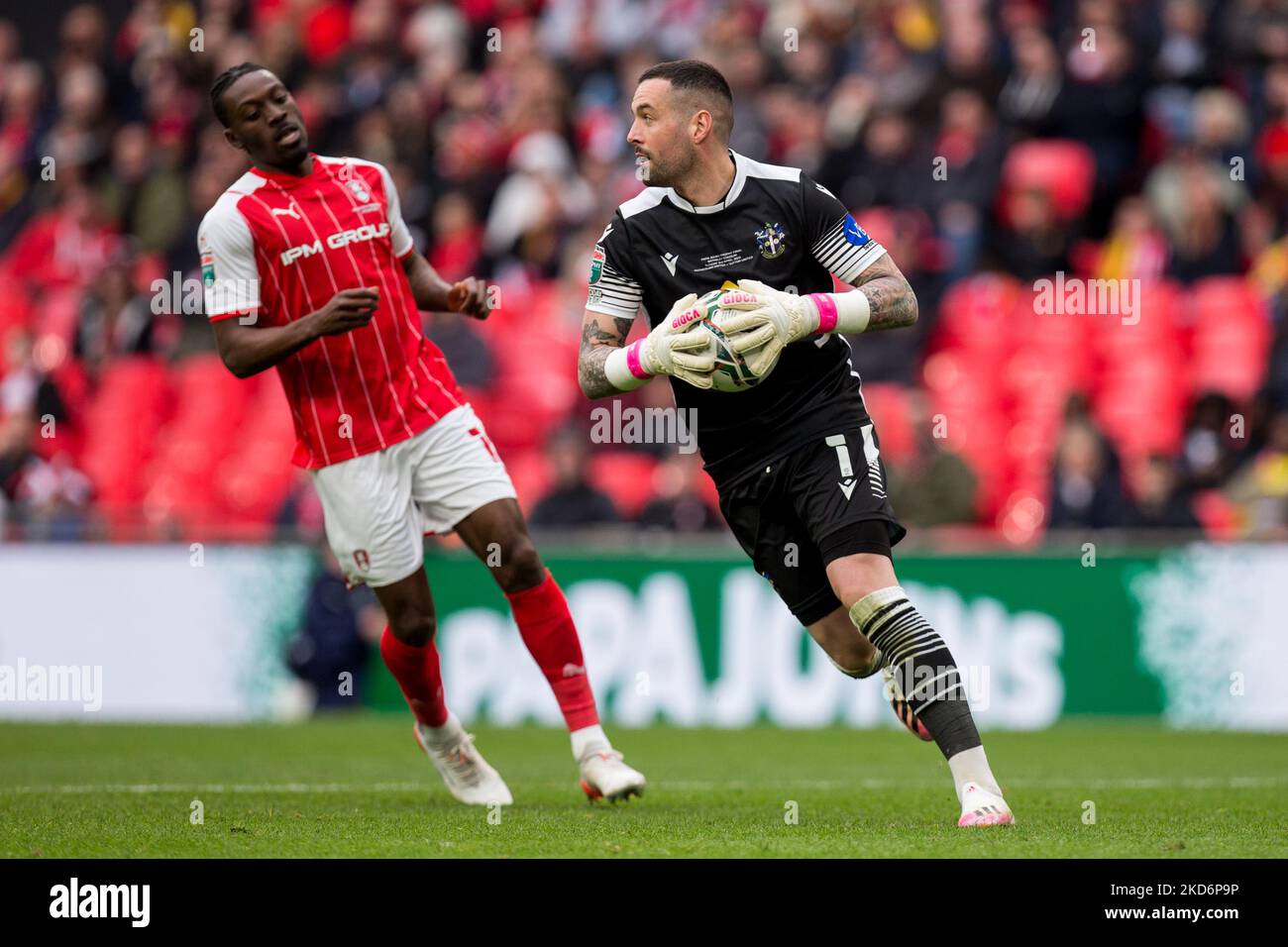 Dean Bouzanis of Sutton United controls the ball during the Papa John ...