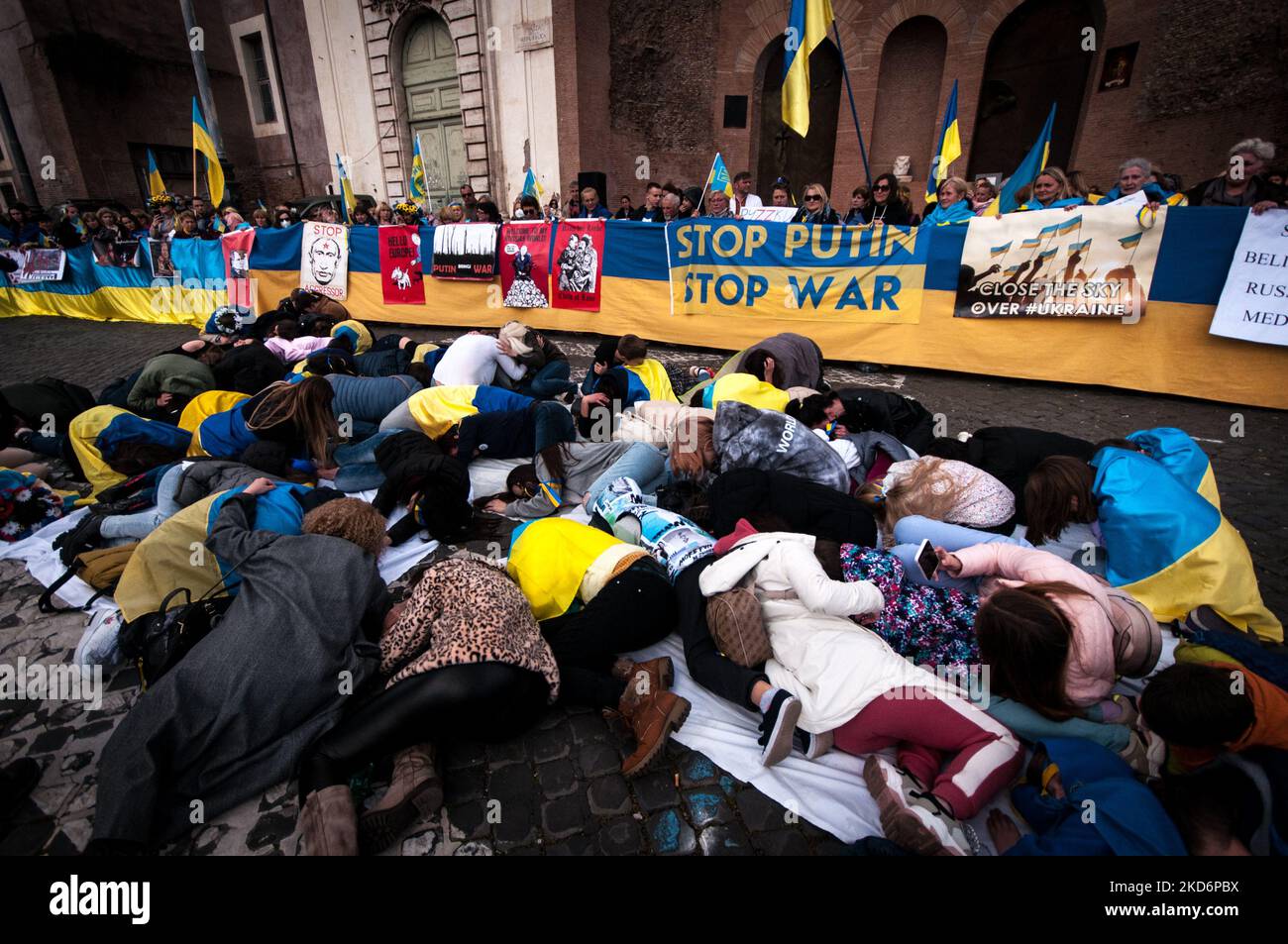 People take part in a protest against war and demanding peace in ...