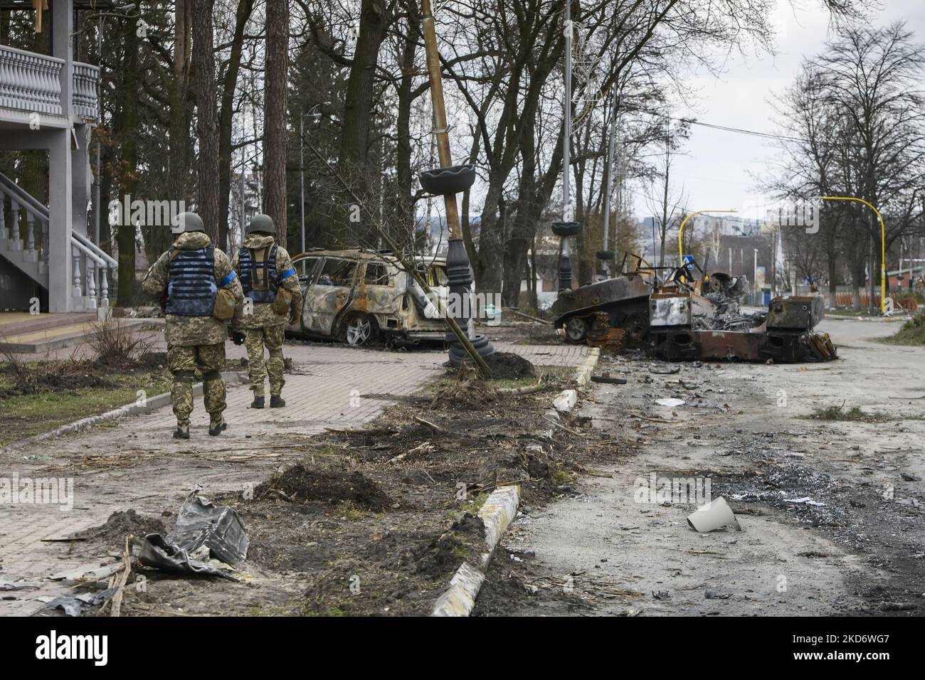 Street with destroyed Russian military machinery in the recaptured by ...