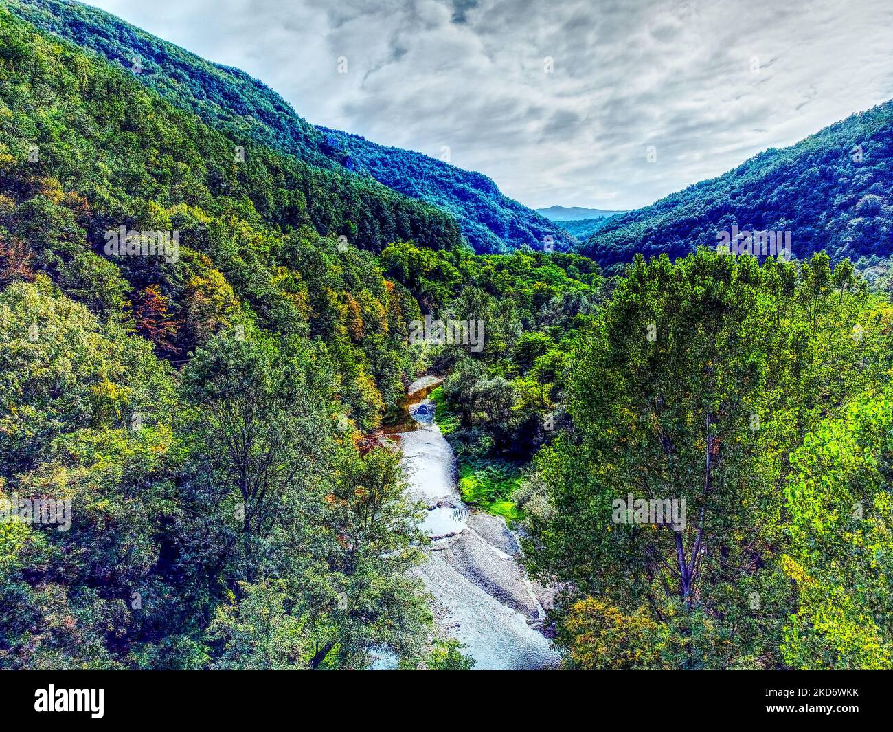 Camping at beautiful river Gradac surrounded by mountains, hills and ...