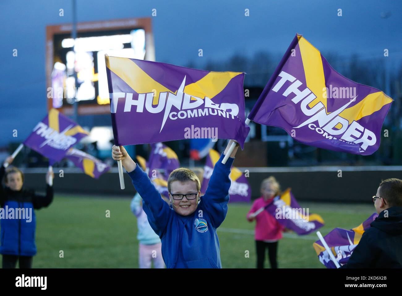 A mascot holds aloft two Thunder flags before the BETFRED Championship ...