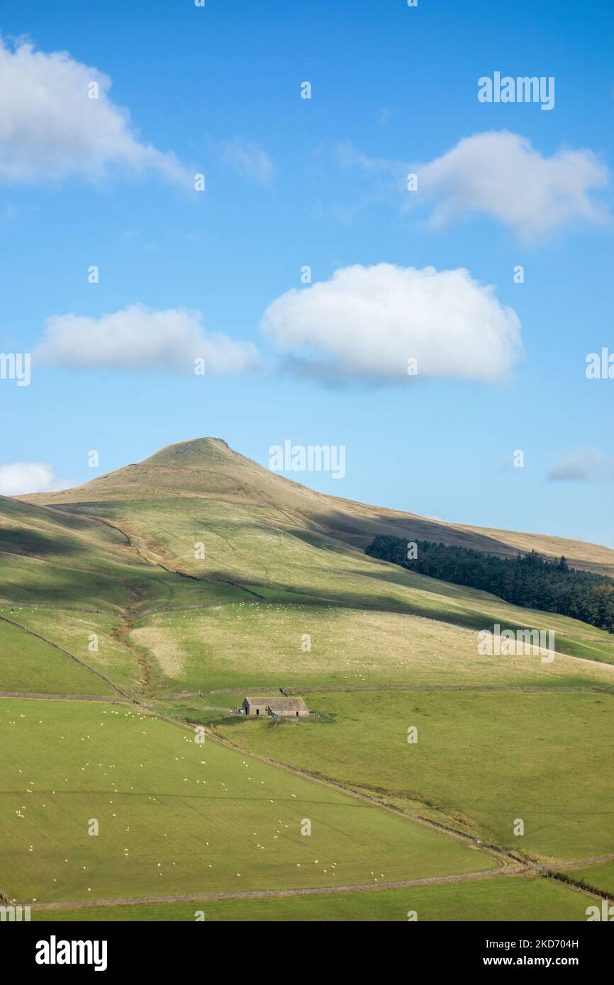Shutlingsloe hill viewed over dry stone wall near the village of ...