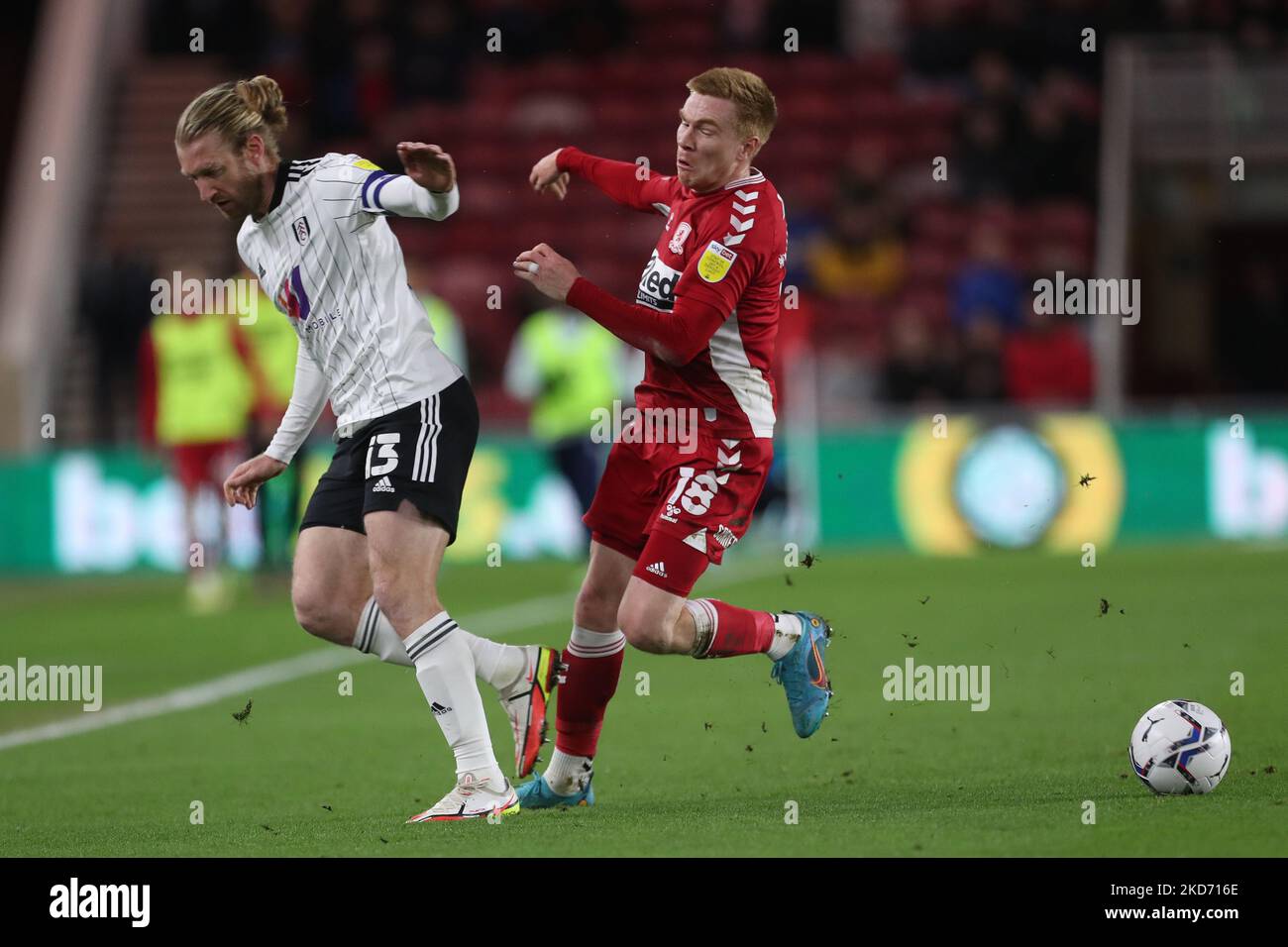 Fulham's Tim Ream clashes with Middlesbrough's Duncan Watmore during ...