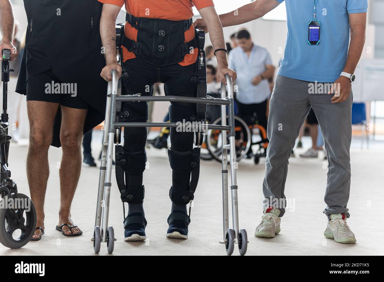 Boy with Mobility Problems in Lower Limbs in Upright Posture Walking ...