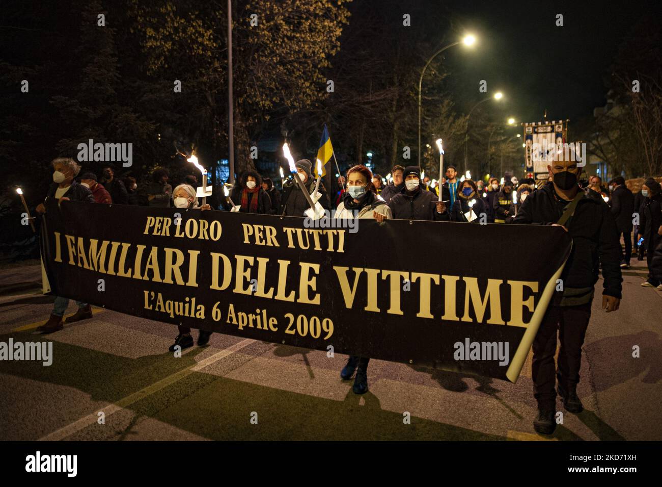 The torchlight procession returns to L'Aquila to mark the longest night ...