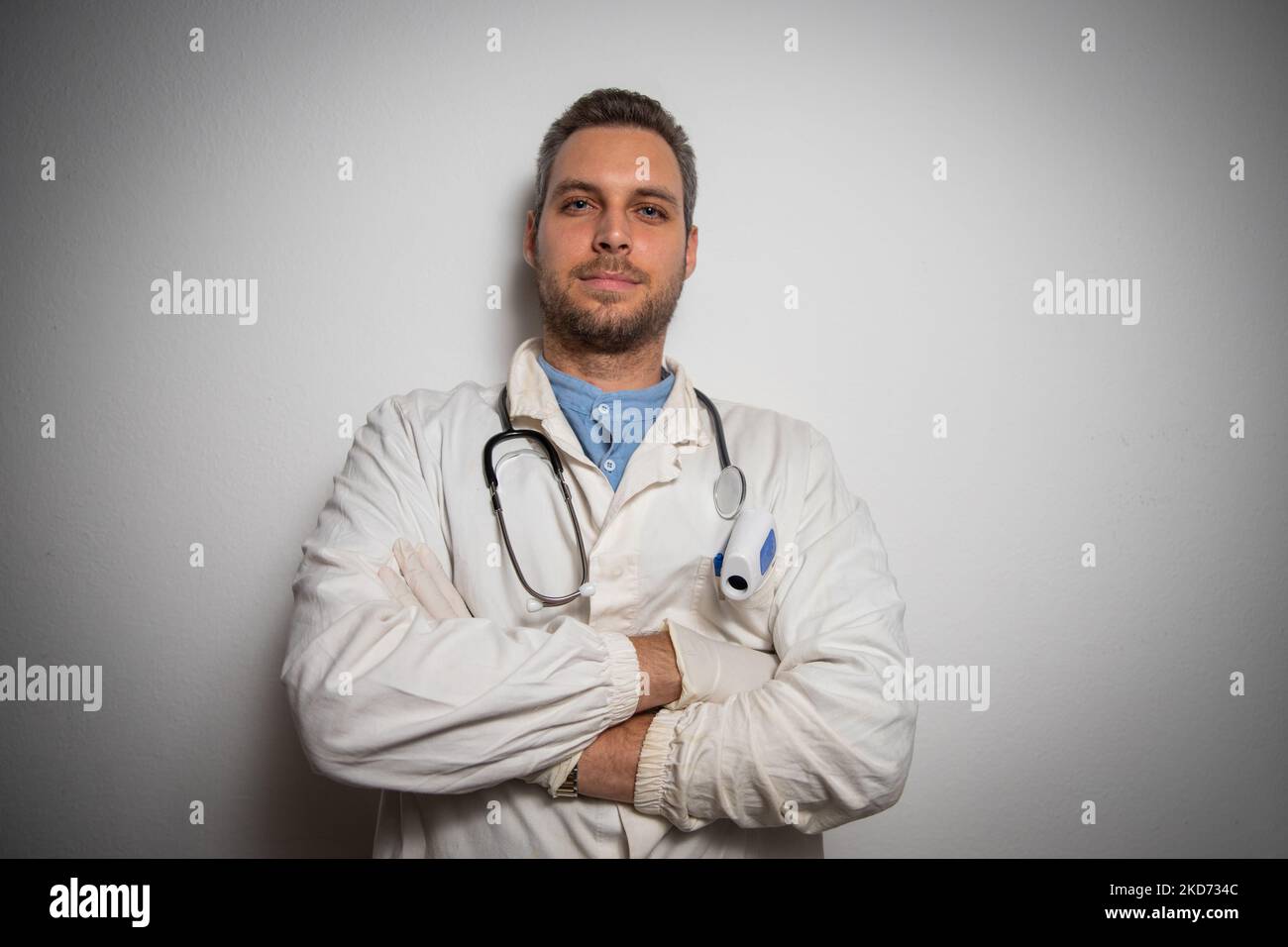 General practitioner wearing his medical instruments resting on the ...