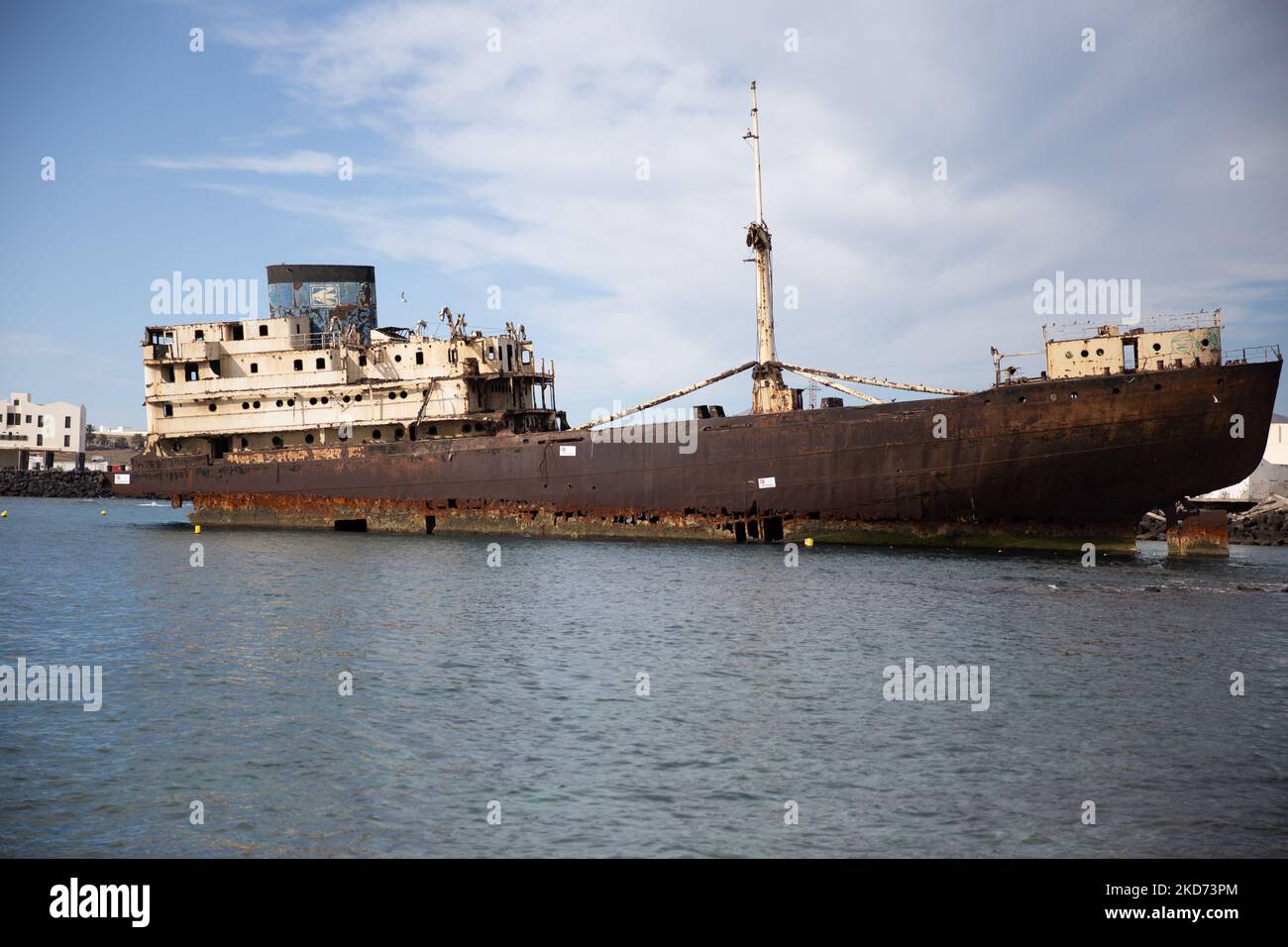 A rusty ship on the sea shore Stock Photo - Alamy