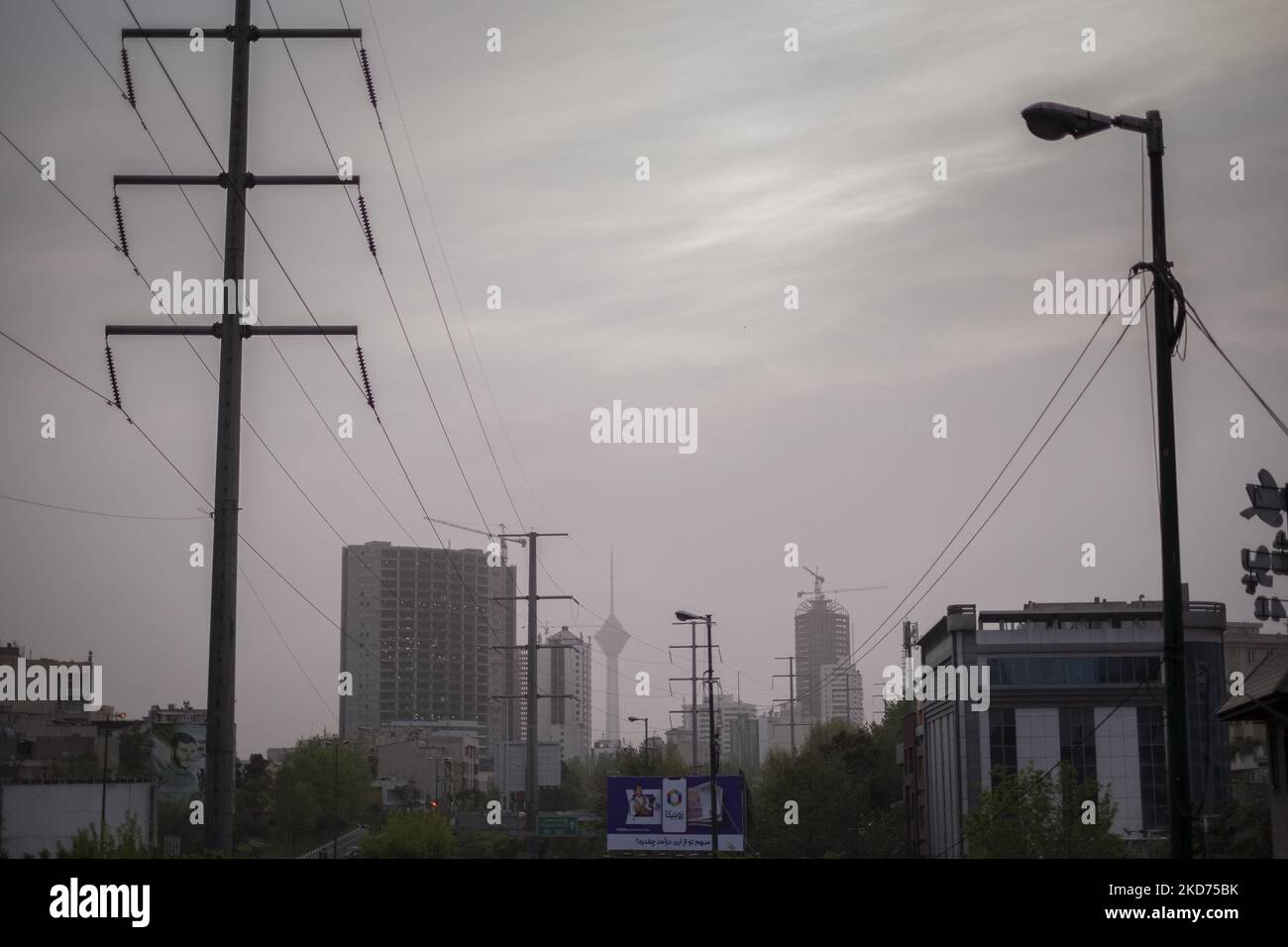 A view of central Tehran during a polluted air, on April 8, 2022 ...