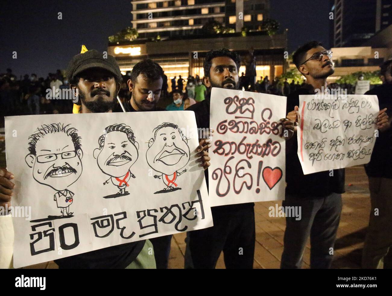 Sri Lankans held national flags and placards protesting on April 9 ...
