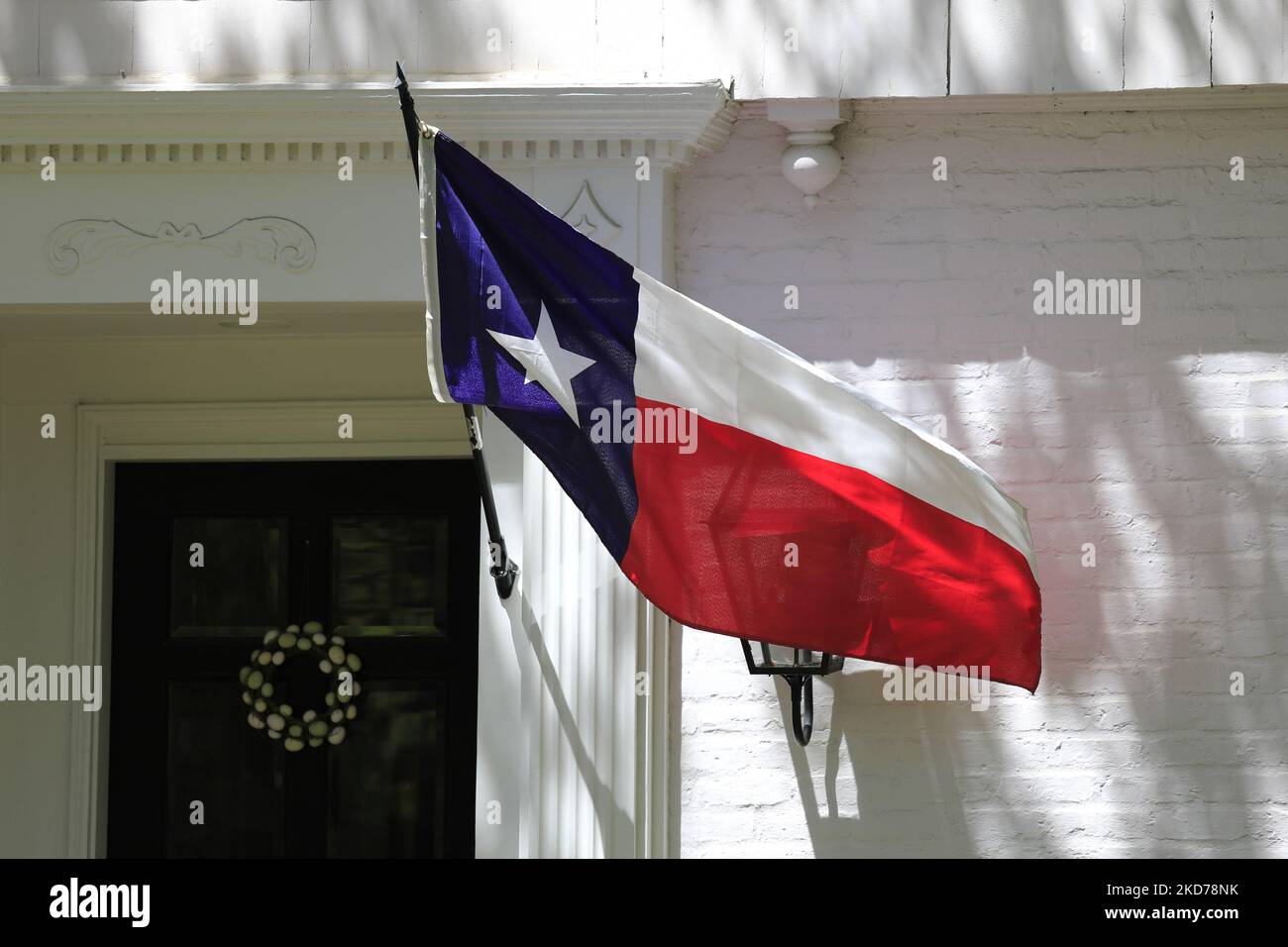 The Texas flag hangs next to Senator Ted Cruz's front door while ...