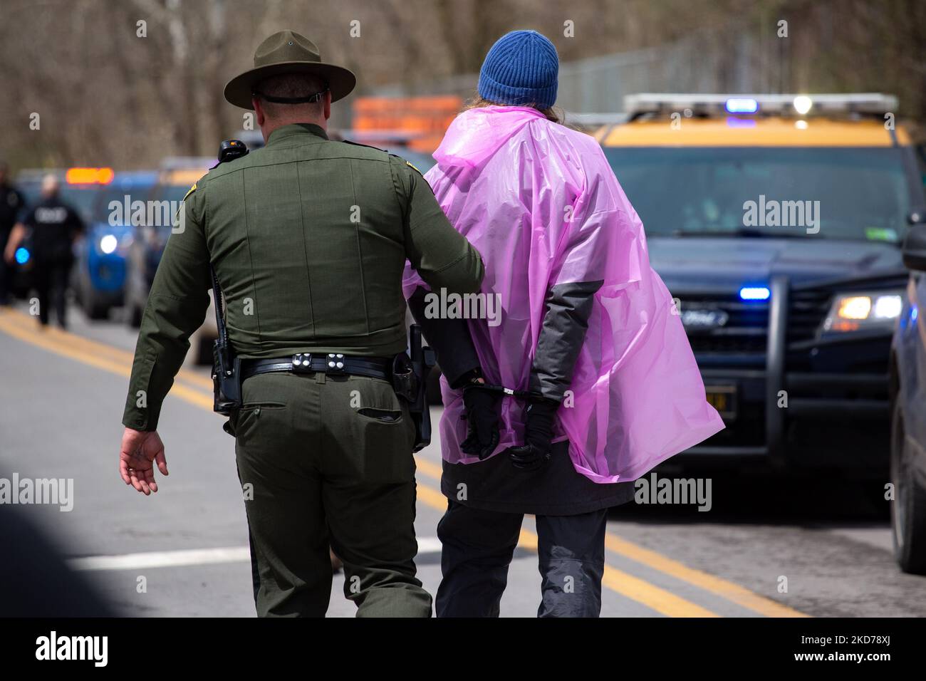Police arrest climate activists blocking the entrance to the Grant Town ...