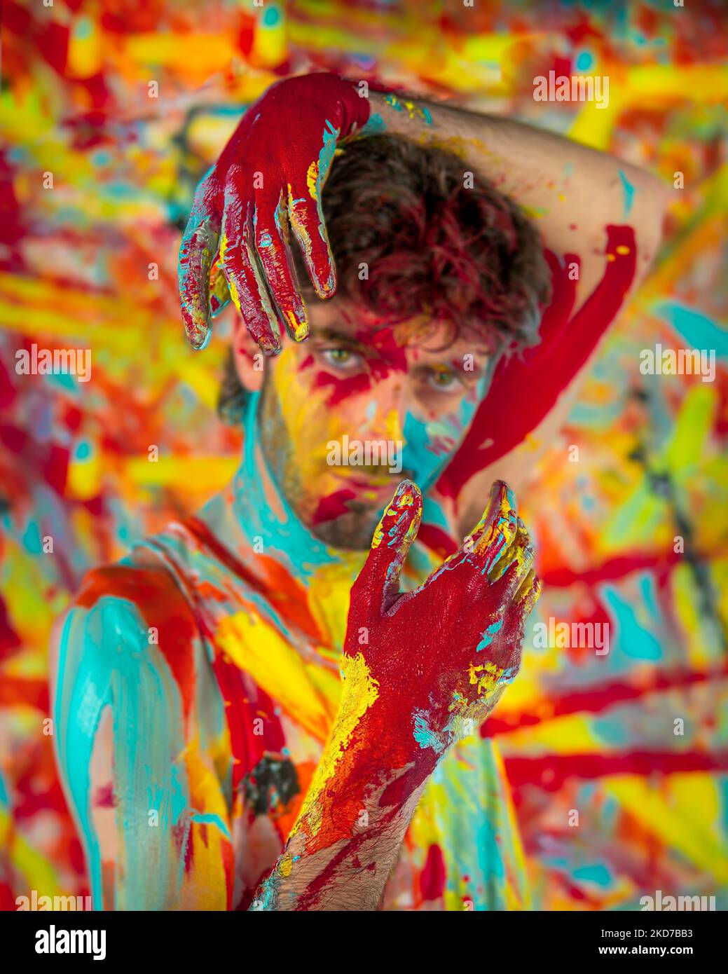 A vertical shot of a portrait of a Caucasian male painted in an ...