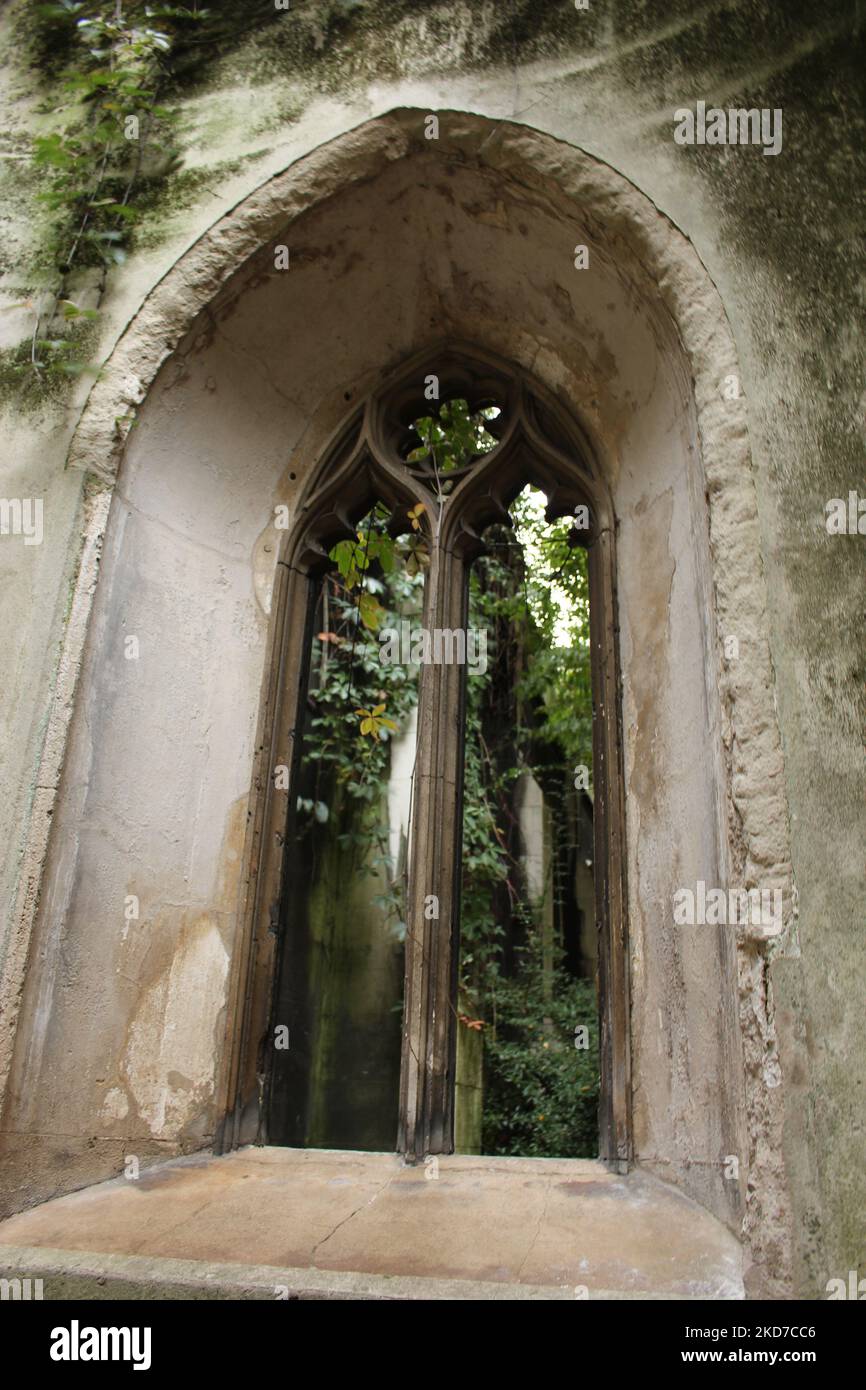 Window at St Dunstan in the East Church Garden, medieval stone cloister ...