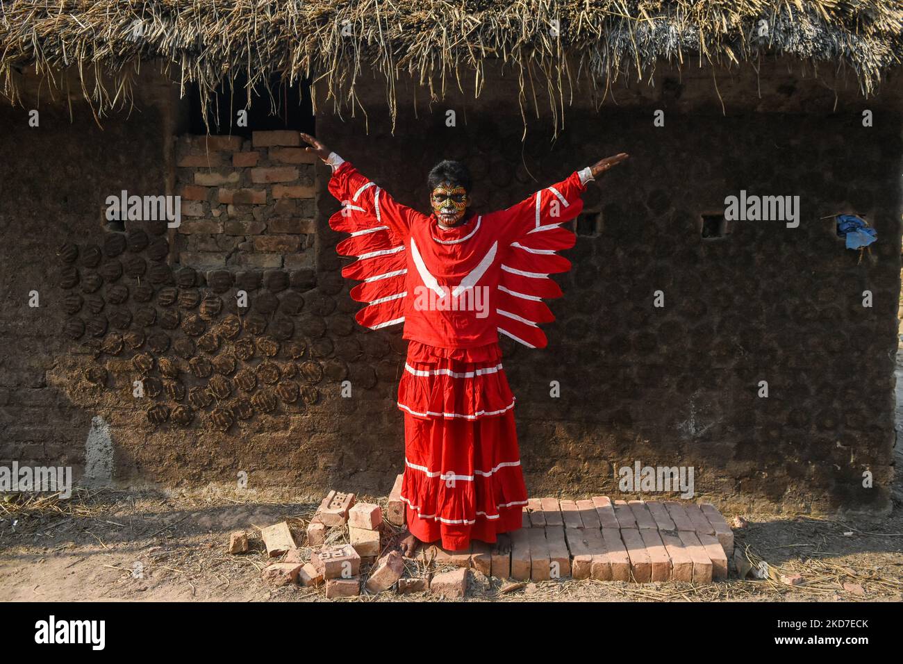 A devotee is seen in his traditional attire of " Bolan " dance , ahead ...