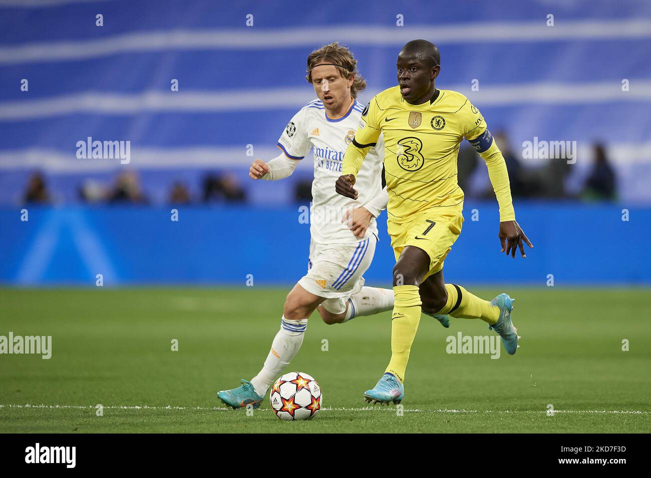 N'Golo Kante of Chelsea and Luka Modric of Real Madrid compete for the ...