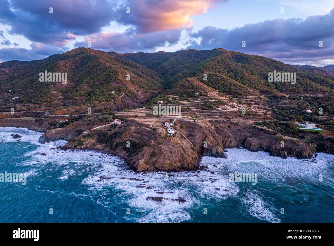 An aerial view of the rocky shore of Cyprus with foamy sea waves Stock ...