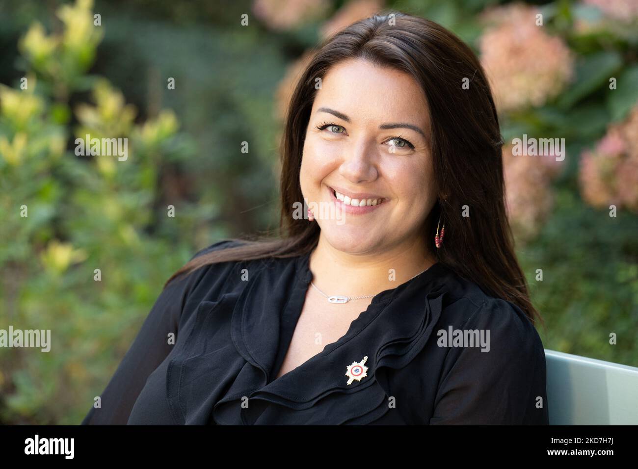 Deputy of the group Renaissance, Julie Delpech poses in the garden of ...