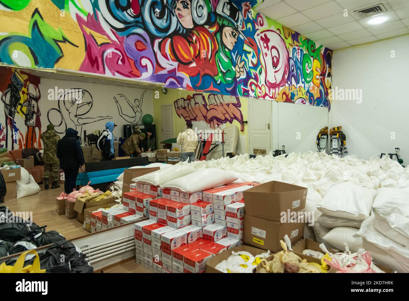 Ukrainian soldiers are seen collecting goods from the storage of the ...