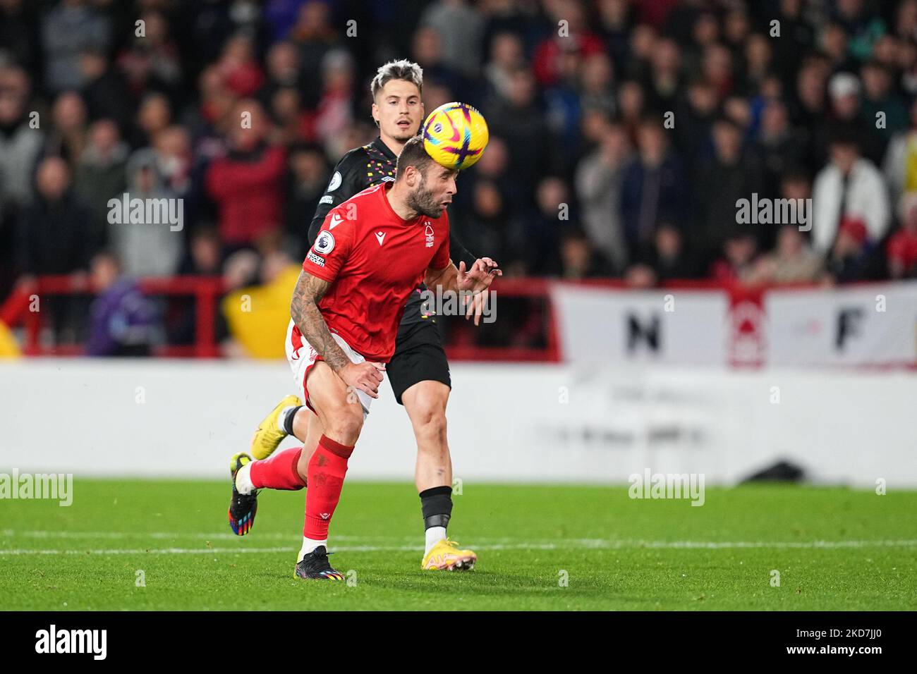 Steve Cook of Nottingham Forest makes a header during the Premier ...
