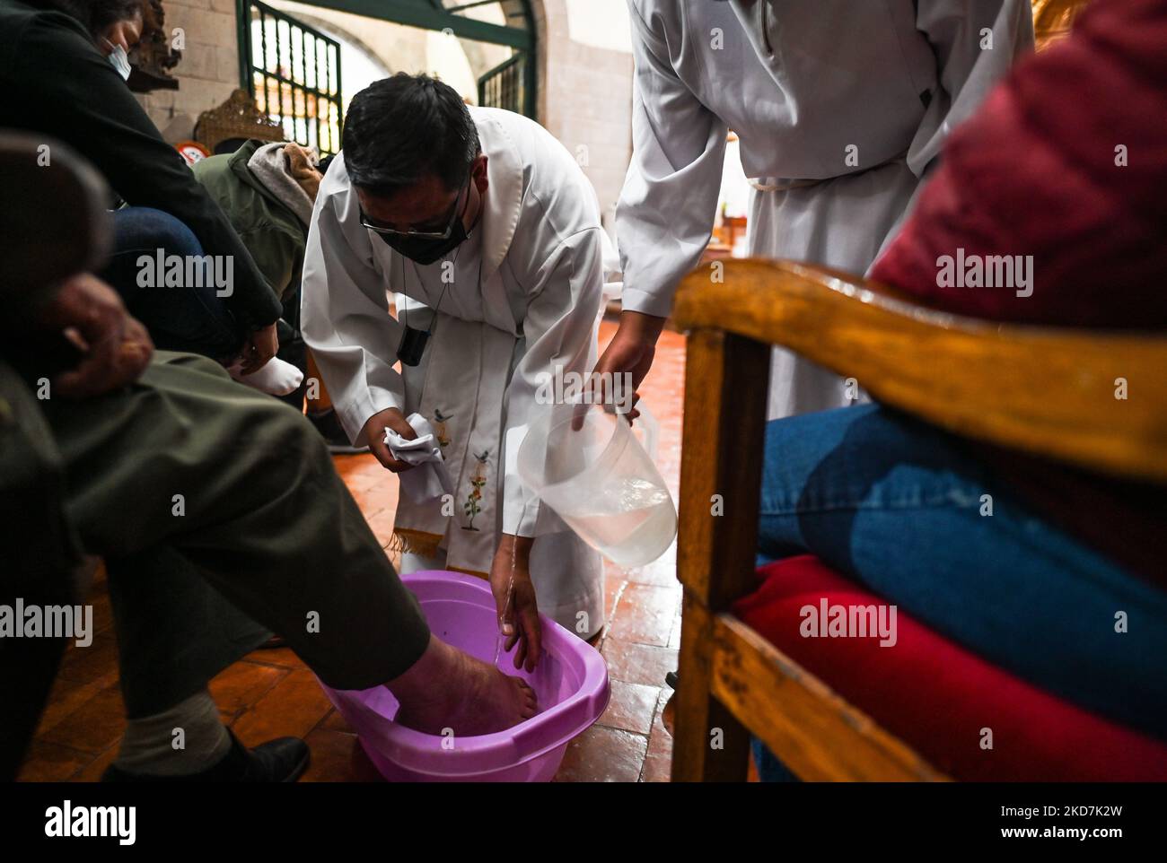 Washing of feet by a local priest of the Church of Santa Ana during the ...