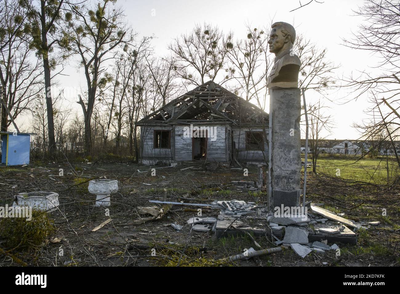 Damaged soviet monument near house destroyed by shelling russian army ...