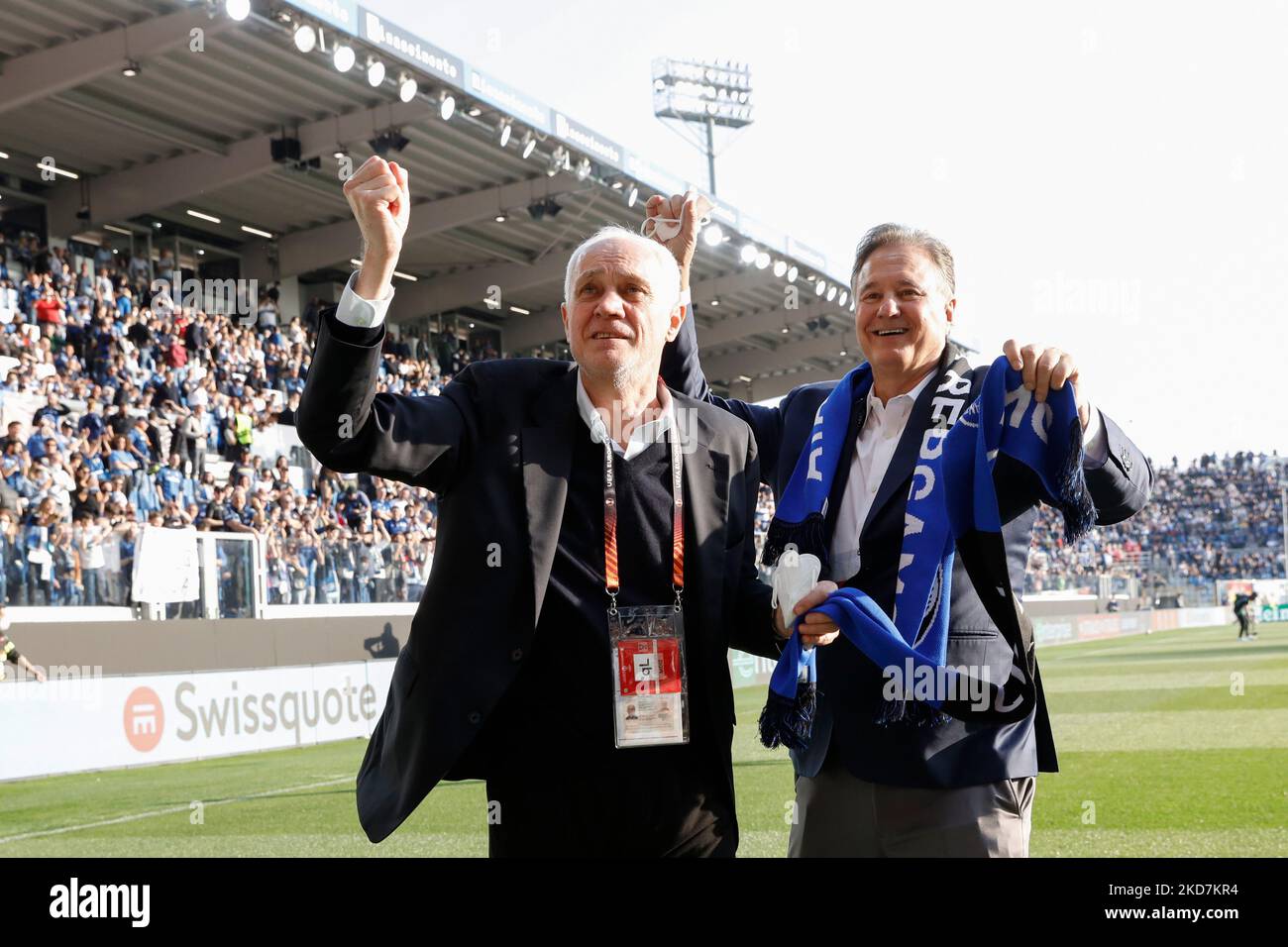Antonio Percassi and Steve Pagliuca hold up a Atalanta BC scarf during ...