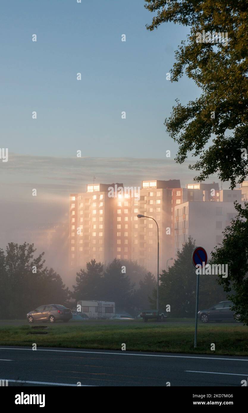 A bright tall building in morning sunrise Stock Photo - Alamy