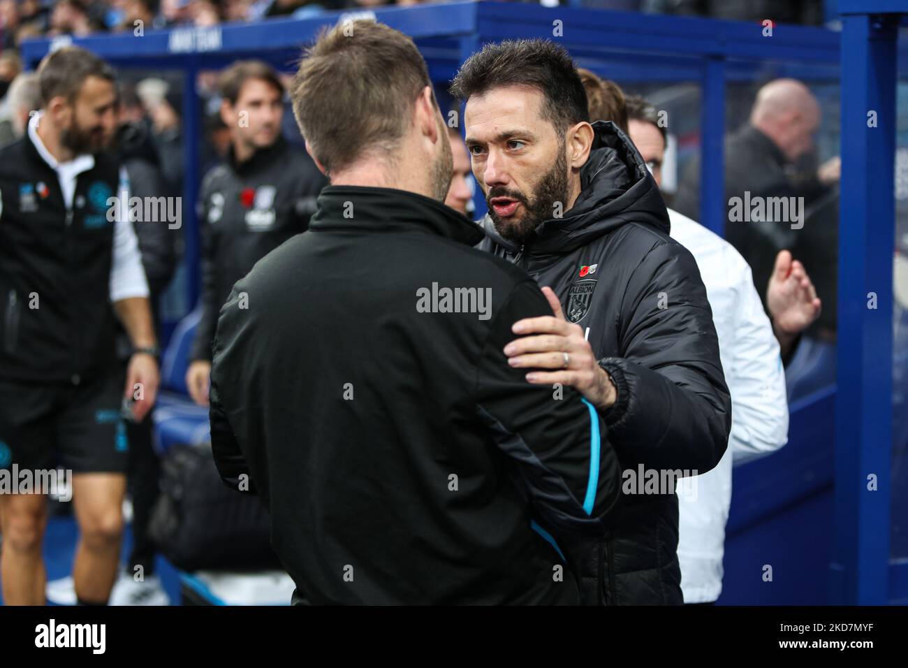 Queens Park Rangers manager Michael Beale (left) speaks to West ...